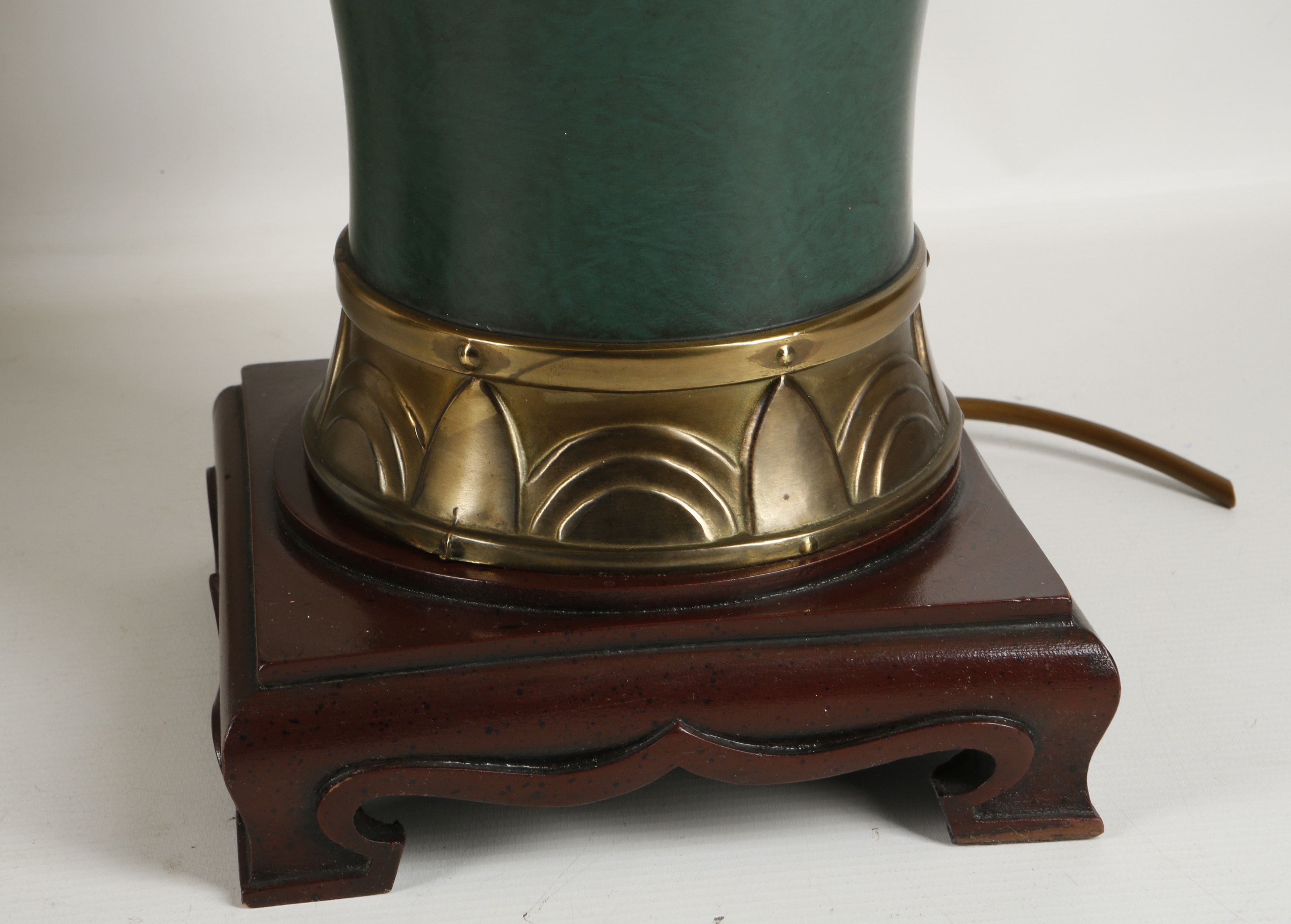 Lot 523 - A pair of table lamps, brass leaf collar