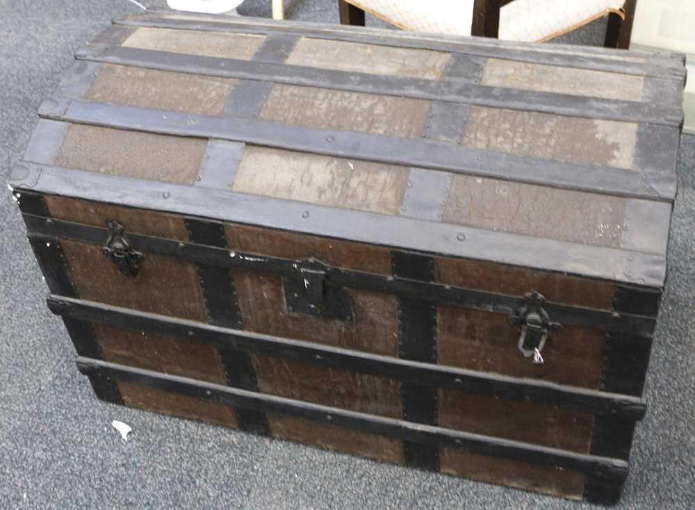 Lot 536 - A dome top shipping trunk, wood and metal