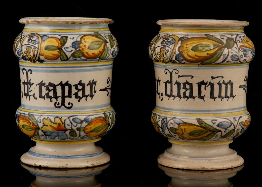 Lot 102 - A PAIR OF SMALL ITALIAN MAIOLICA DRUG JARS,