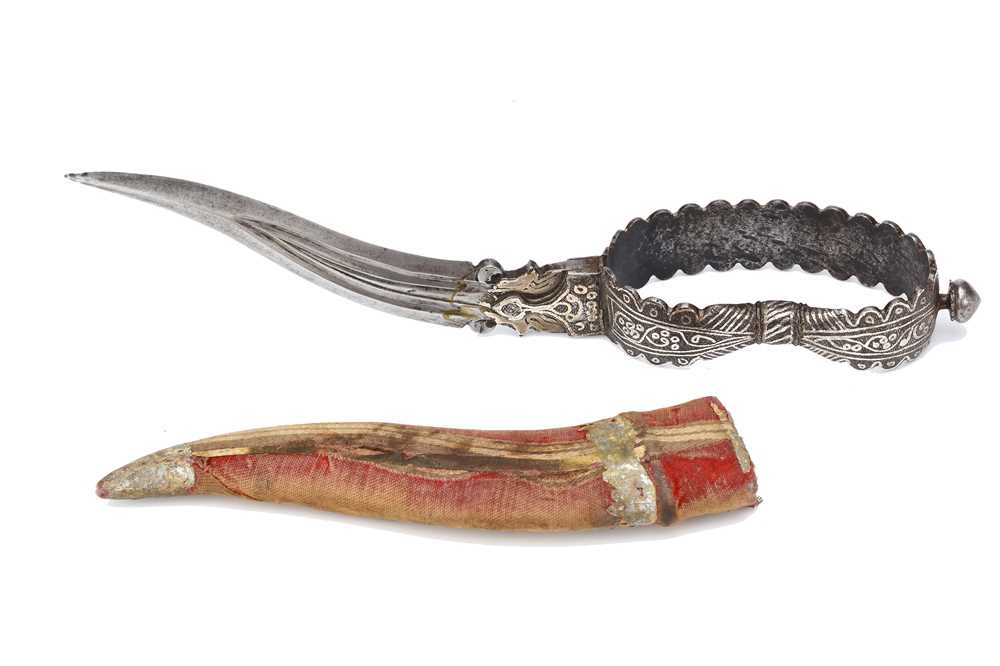 Lot 131 - AN INDIAN BICHWA TYPE DAGGER, with silver