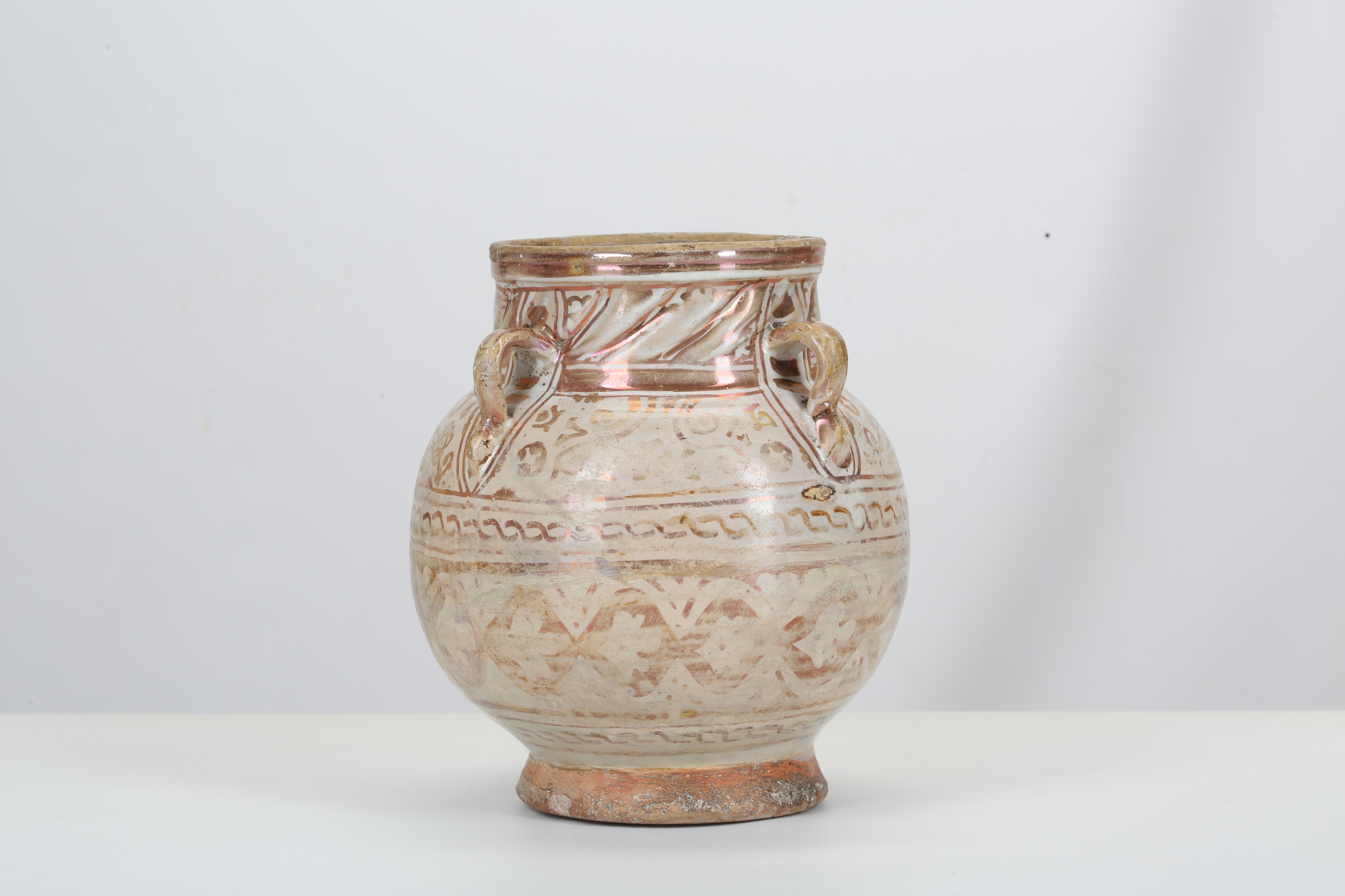 Lot 46 - AN HISPANO-MORESQUE COPPER-LUSTRE POTTERY