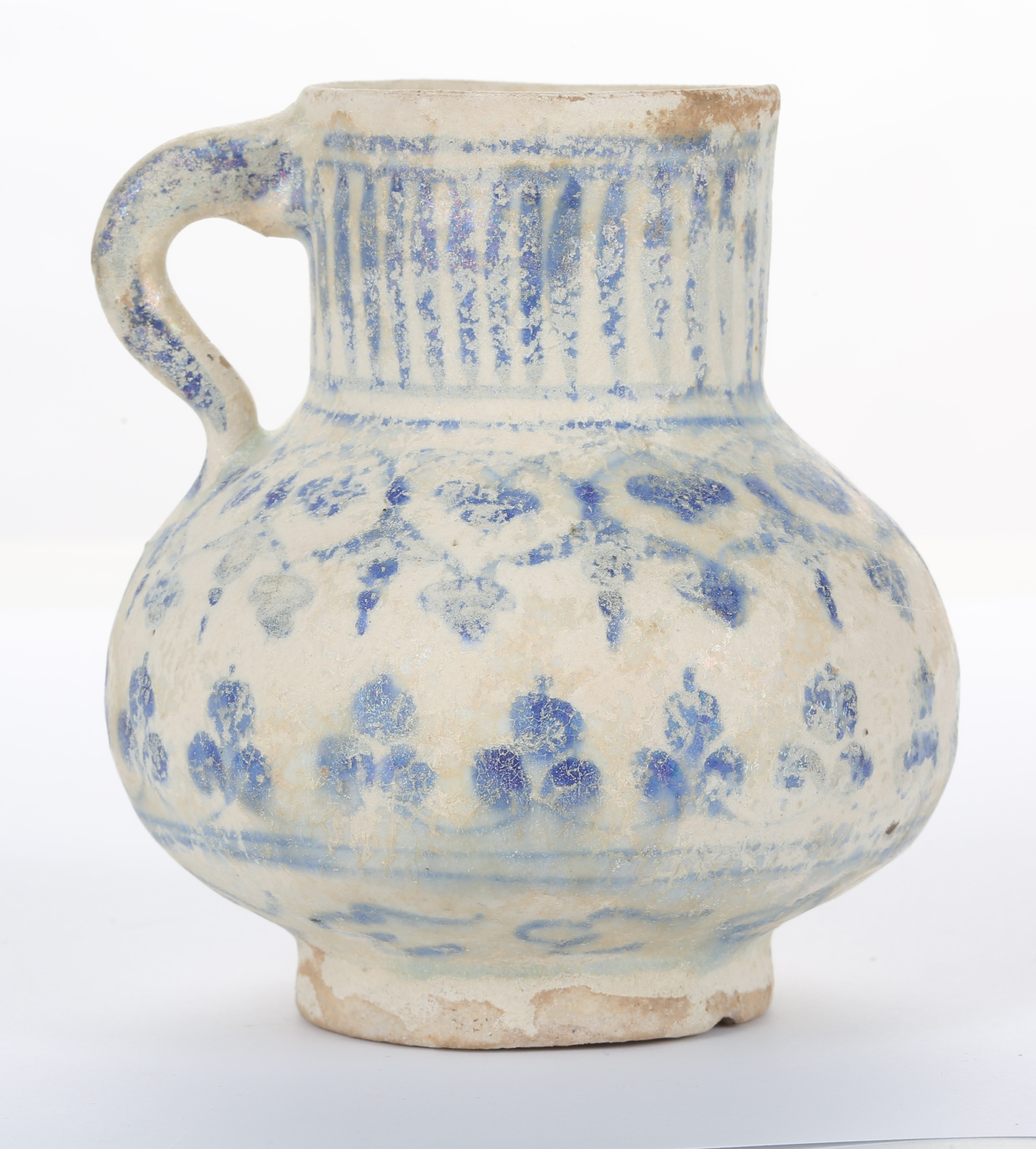 Lot 154 - A TIMURID BLUE AND WHITE POTTERY JUG Iran or