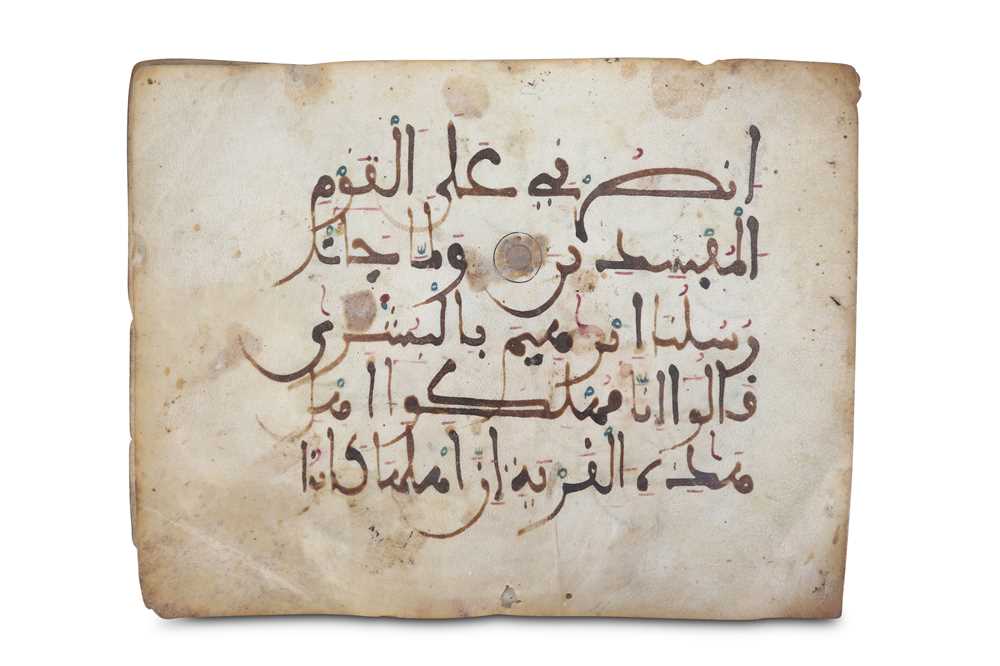Lot 29 - THREE QUR'AN BIFOLIA IN MAGHRIBI SCRIPT ON