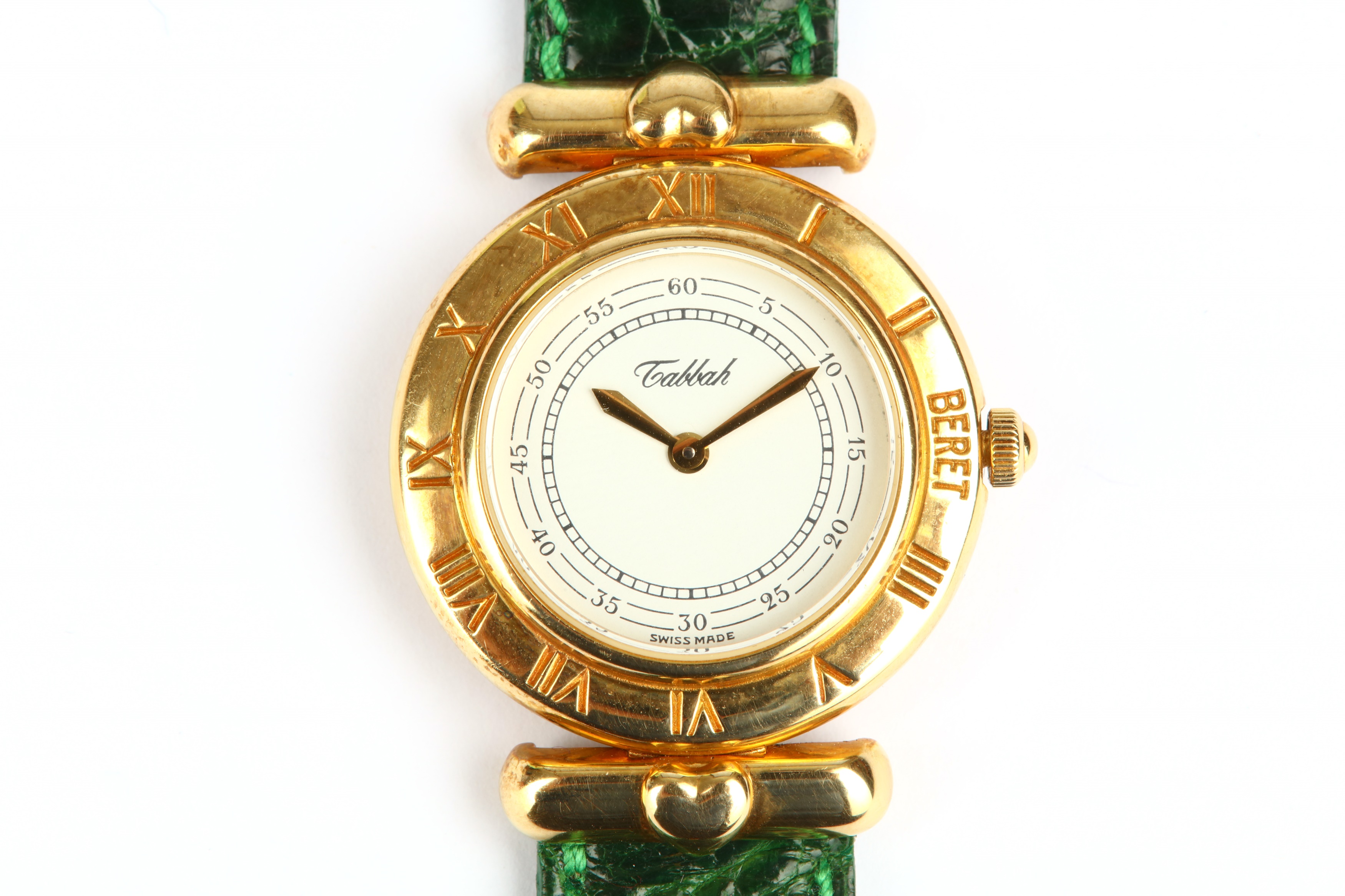 Lot 386 - Tabbah. An 18K yellow gold quartz wristwatch.