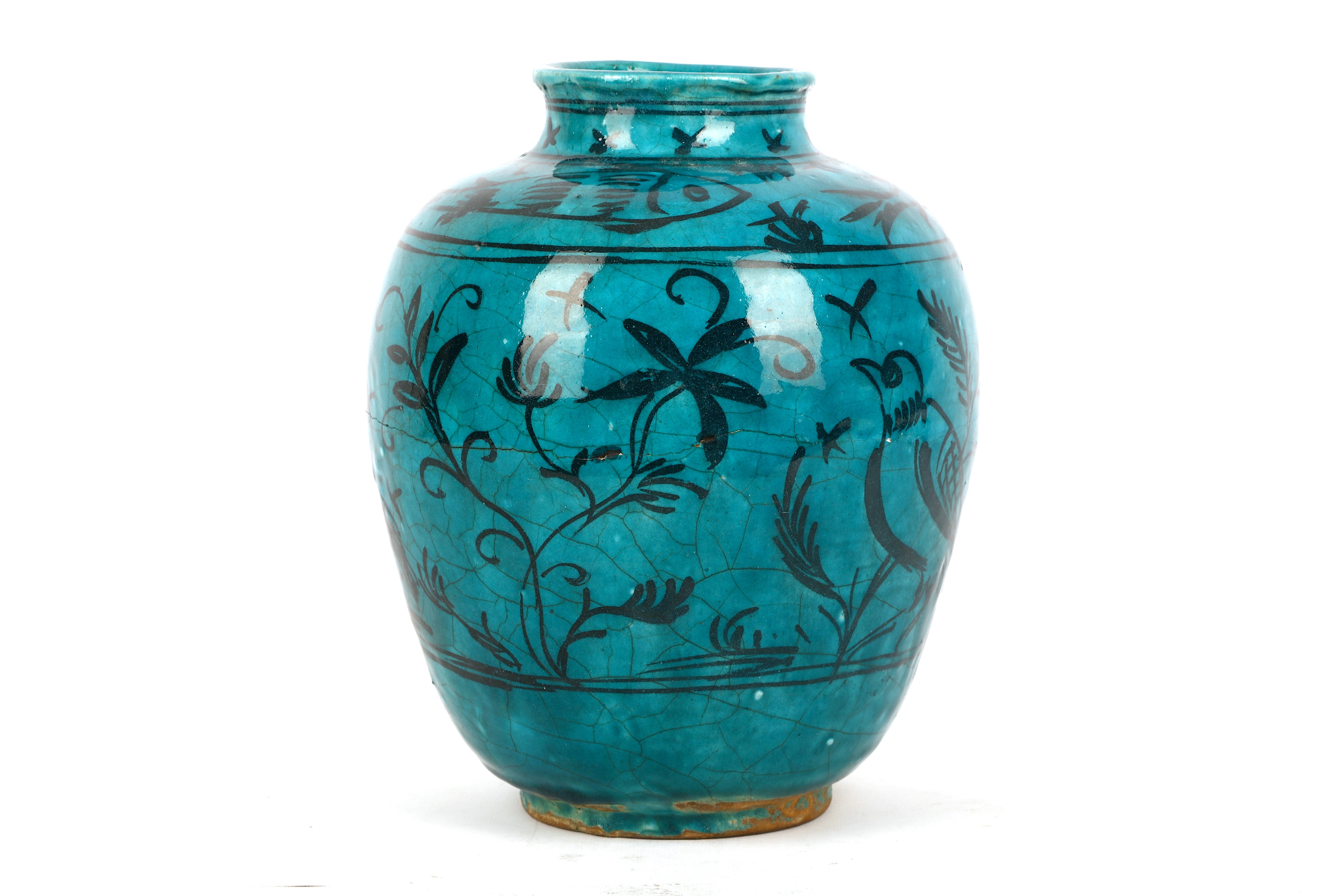 Lot 216 - A Qajar turquoise-glazed pottery vase Iran,