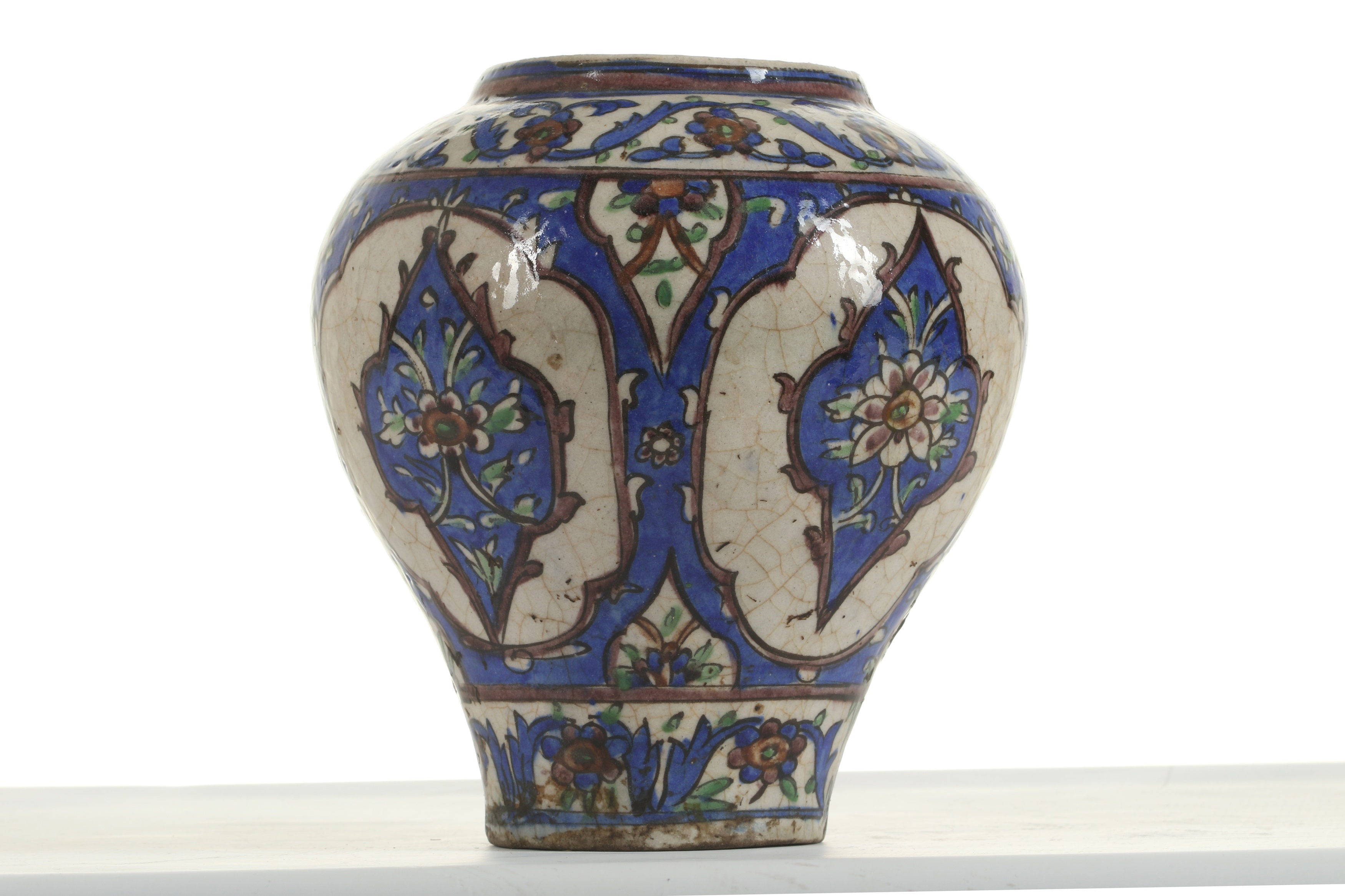 Lot 750 - A Qajar pottery vase, Iran, late 19th