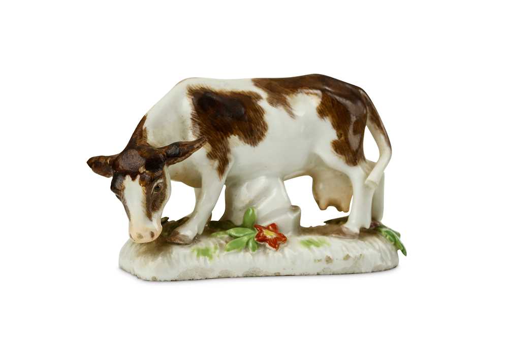 Lot 147 - A MEISSEN PORCELAIN MINIATURE MODEL OF A COW,