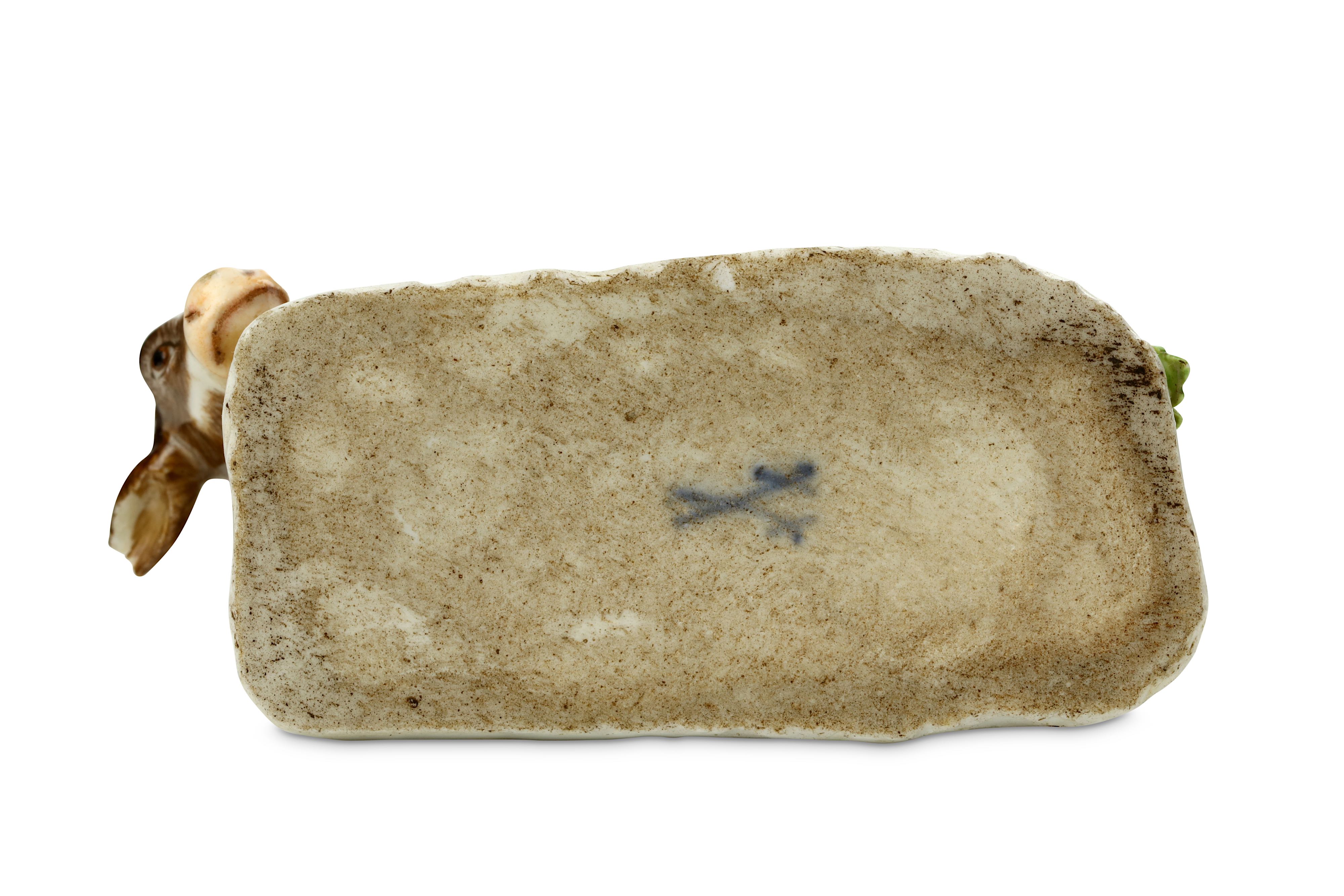 Lot 147 - A MEISSEN PORCELAIN MINIATURE MODEL OF A COW,