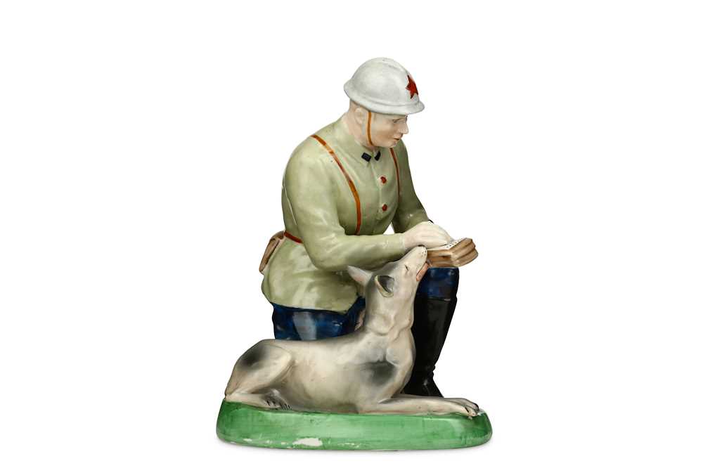 Lot 164 - A SOVIET RUSSIAN PORCELAIN PROPAGANDA FIGURE