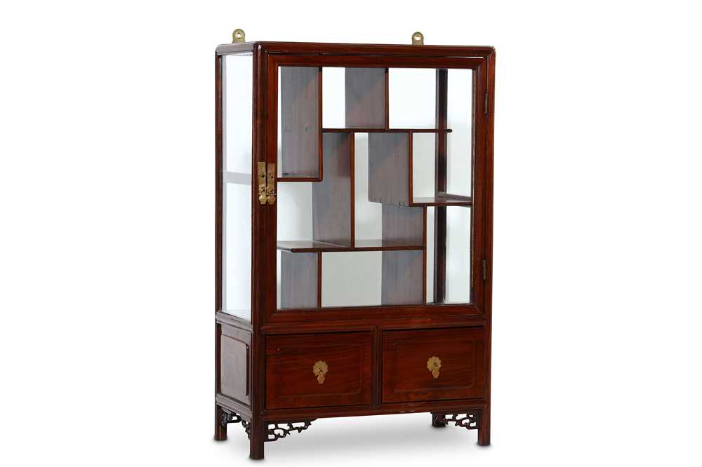 Lot 426 - A SMALL CHINESE WOOD CABINET. Late Qing