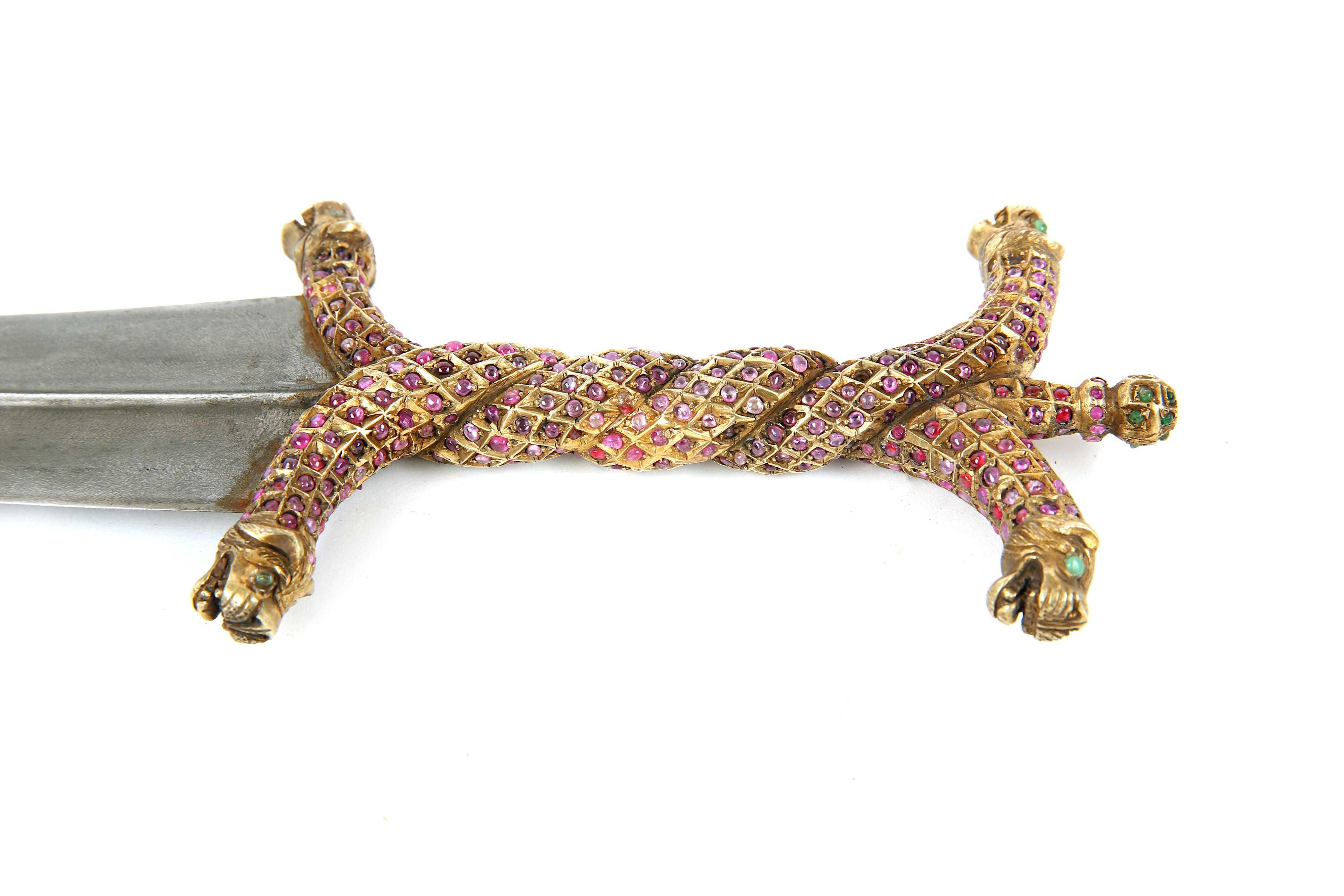 Lot 76 - An Indian chilanum dagger with yellow metal