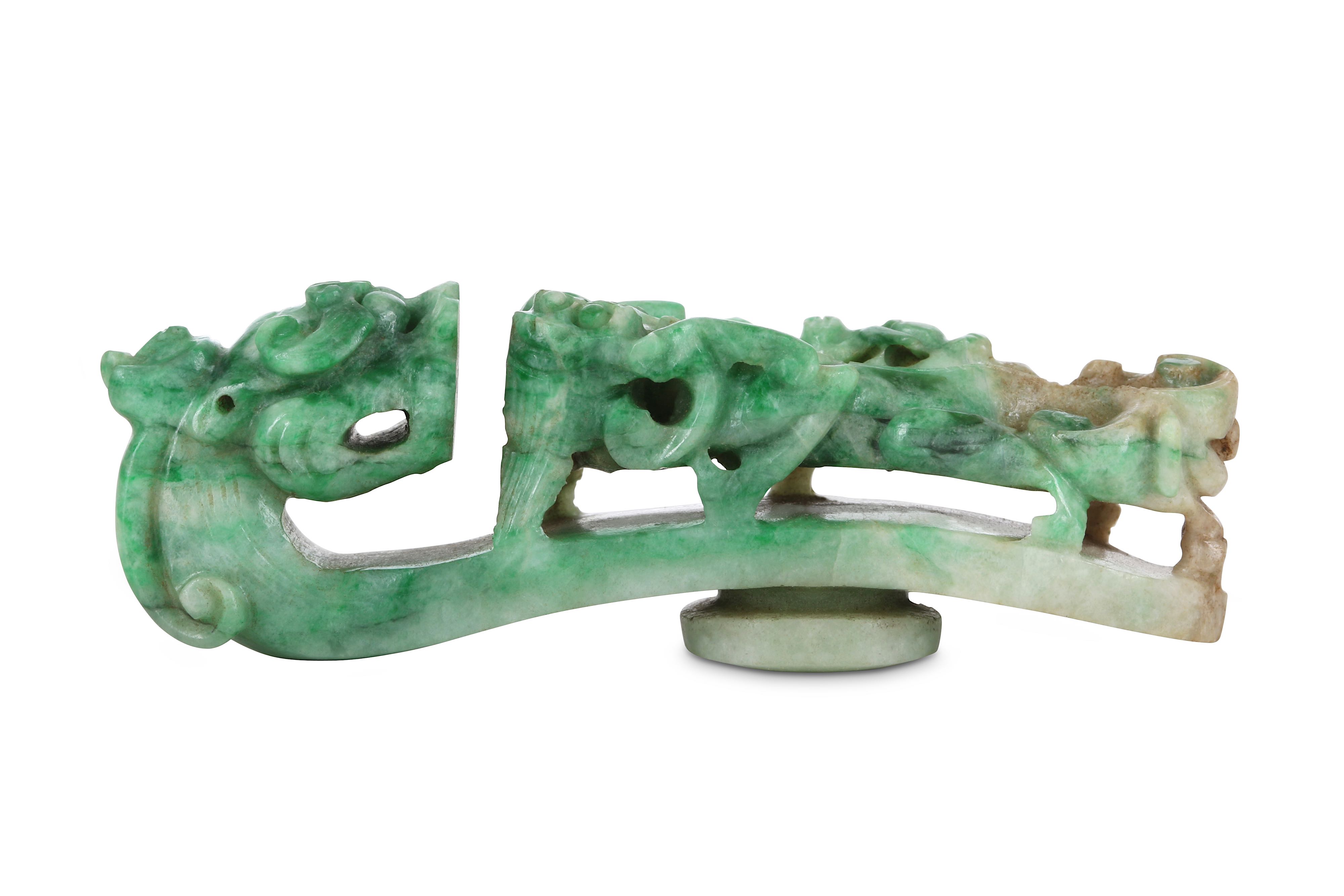 Lot 245 - A CHINESE JADEITE 'DRAGON' BELT HOOK. Qing