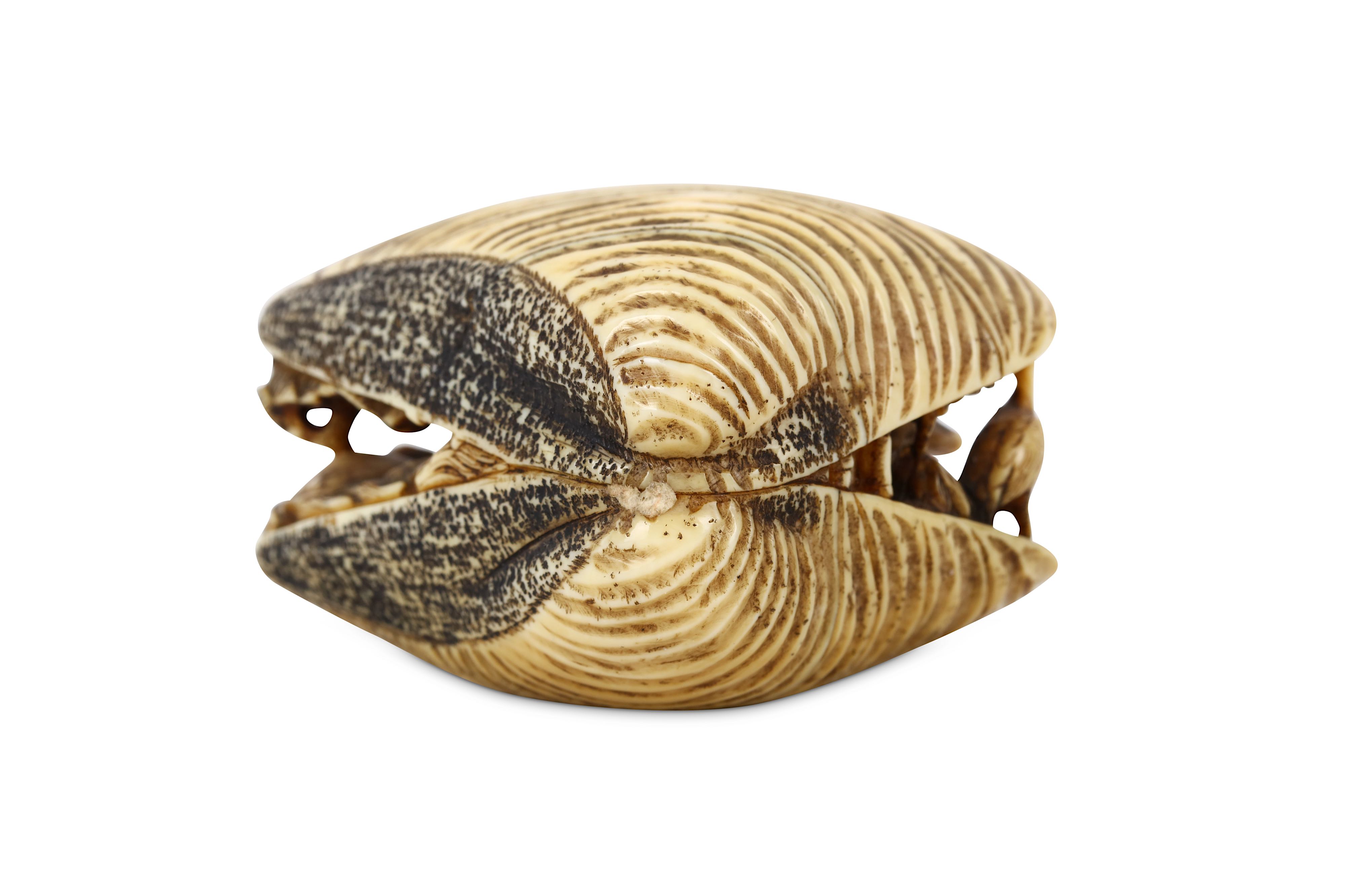 Lot 177 - A JAPANESE IVORY NETSUKE OF THE CLAM’S DREAM.