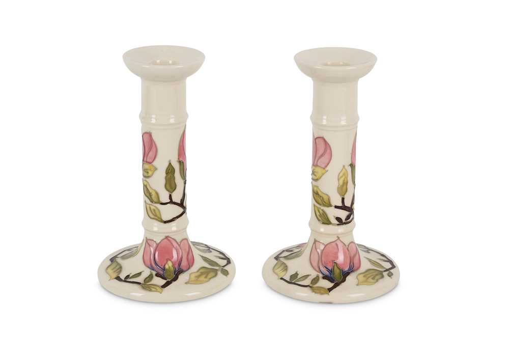 Lot 178 - A pair of Moorcroft pottery candlesticks in