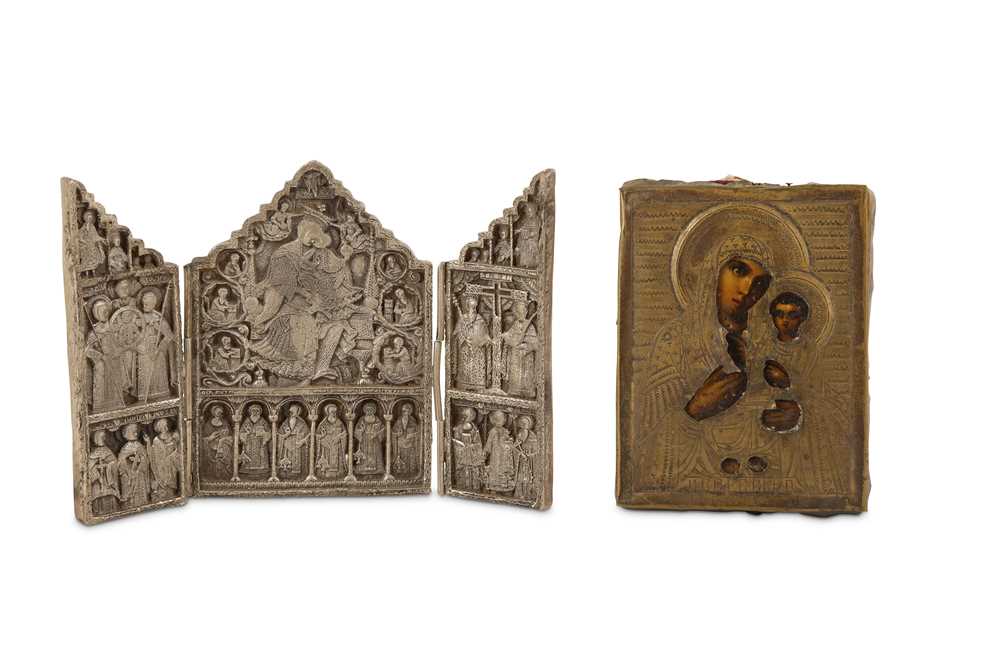Lot 581 - An Orthodox Christian white metal triptych