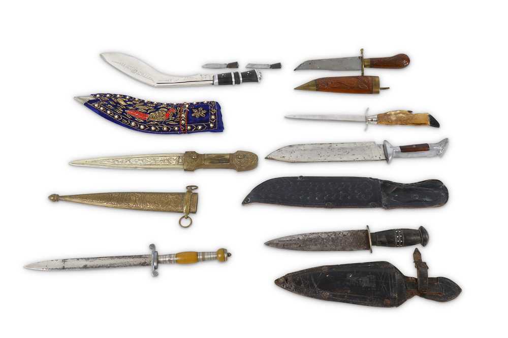 Lot 20 - Seven ethnic knives and daggers, including an