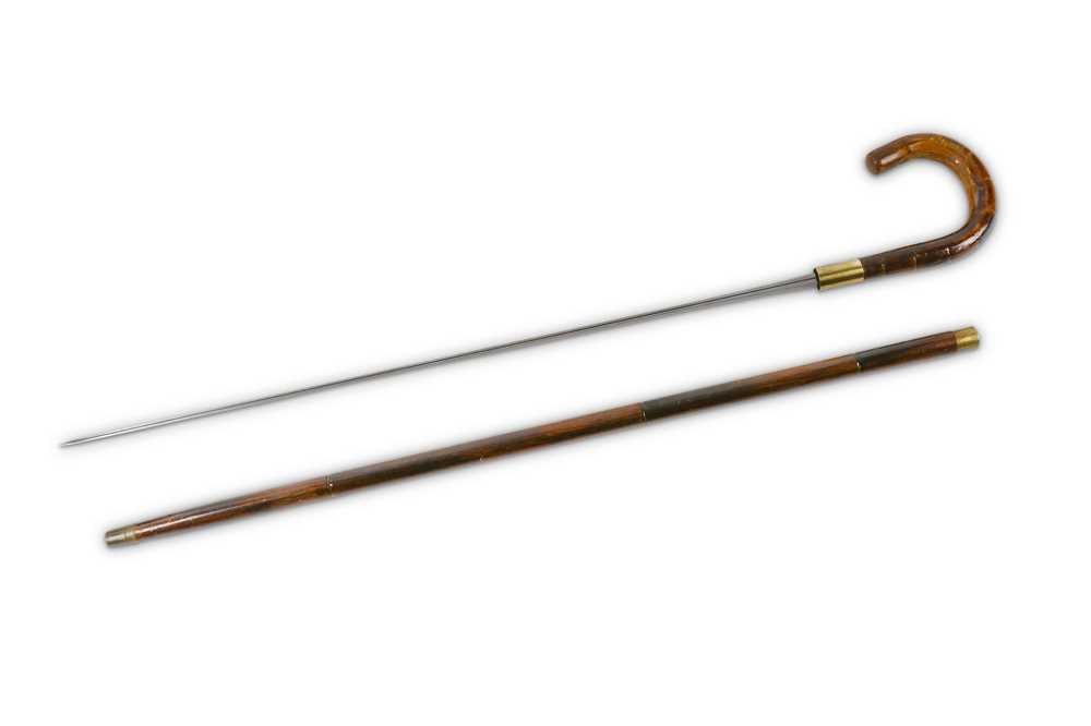 Lot 85 - Two antique sword sticks, one of malacca with