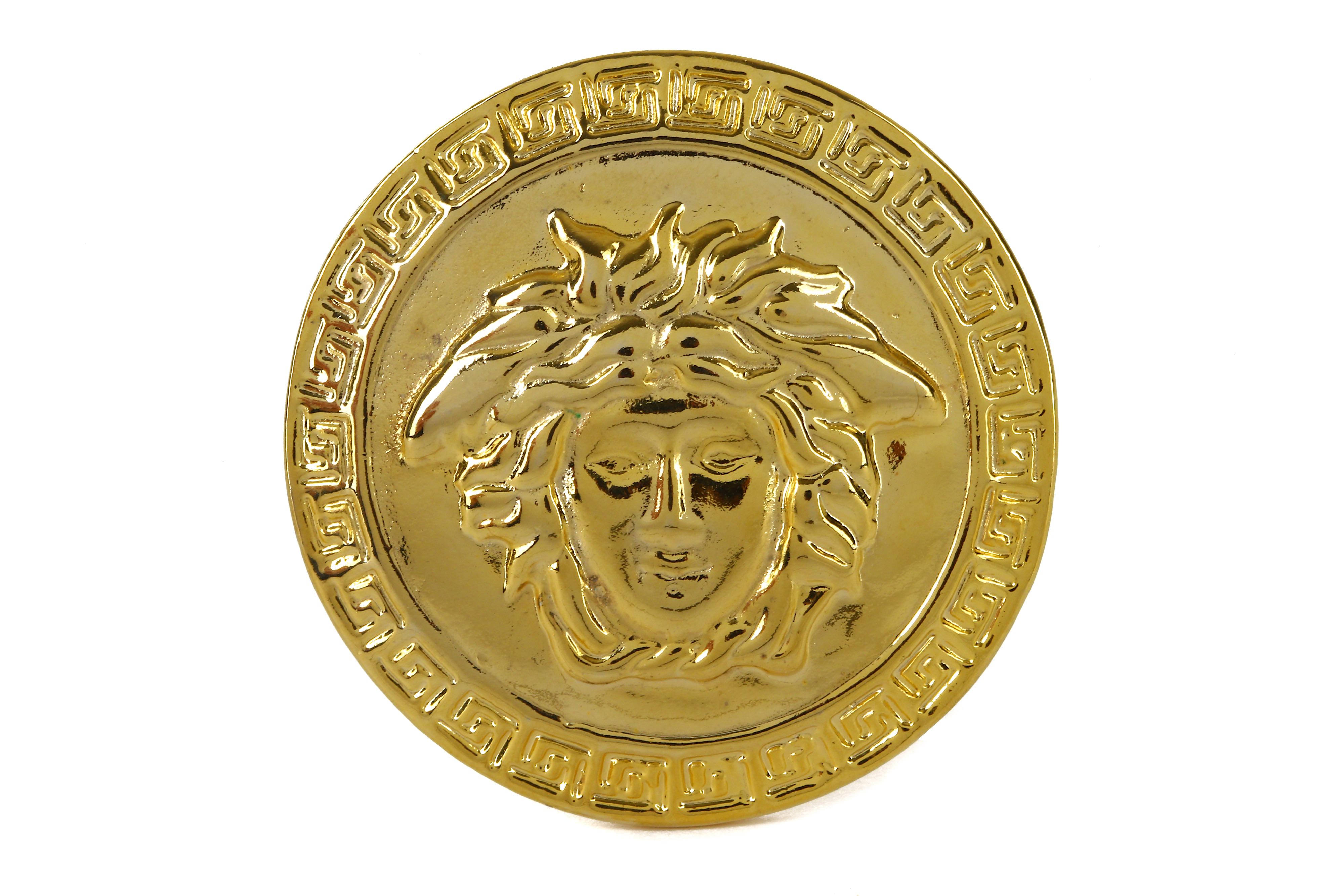 Lot 62 - Versace Medusa Brooch, 1990s, gold tone