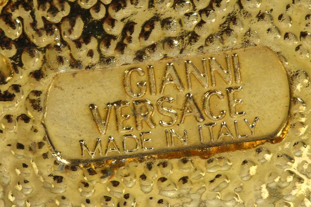 Lot 62 - Versace Medusa Brooch, 1990s, gold tone