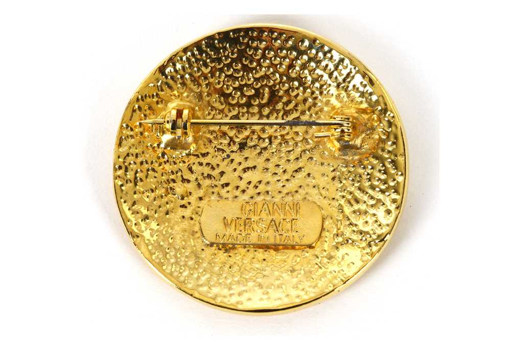 Lot 62 - Versace Medusa Brooch, 1990s, gold tone