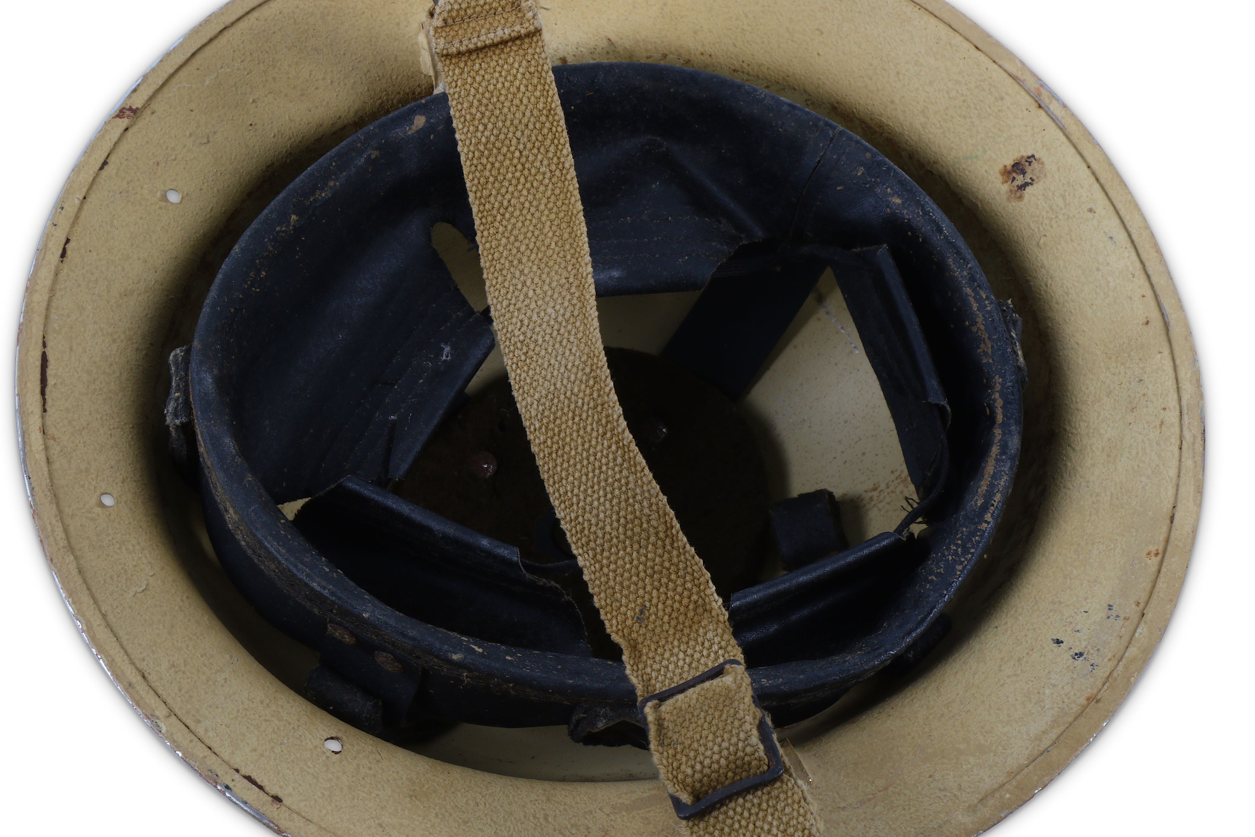 Lot 212 - A WW2 Brodie helmet, Mark II, with original