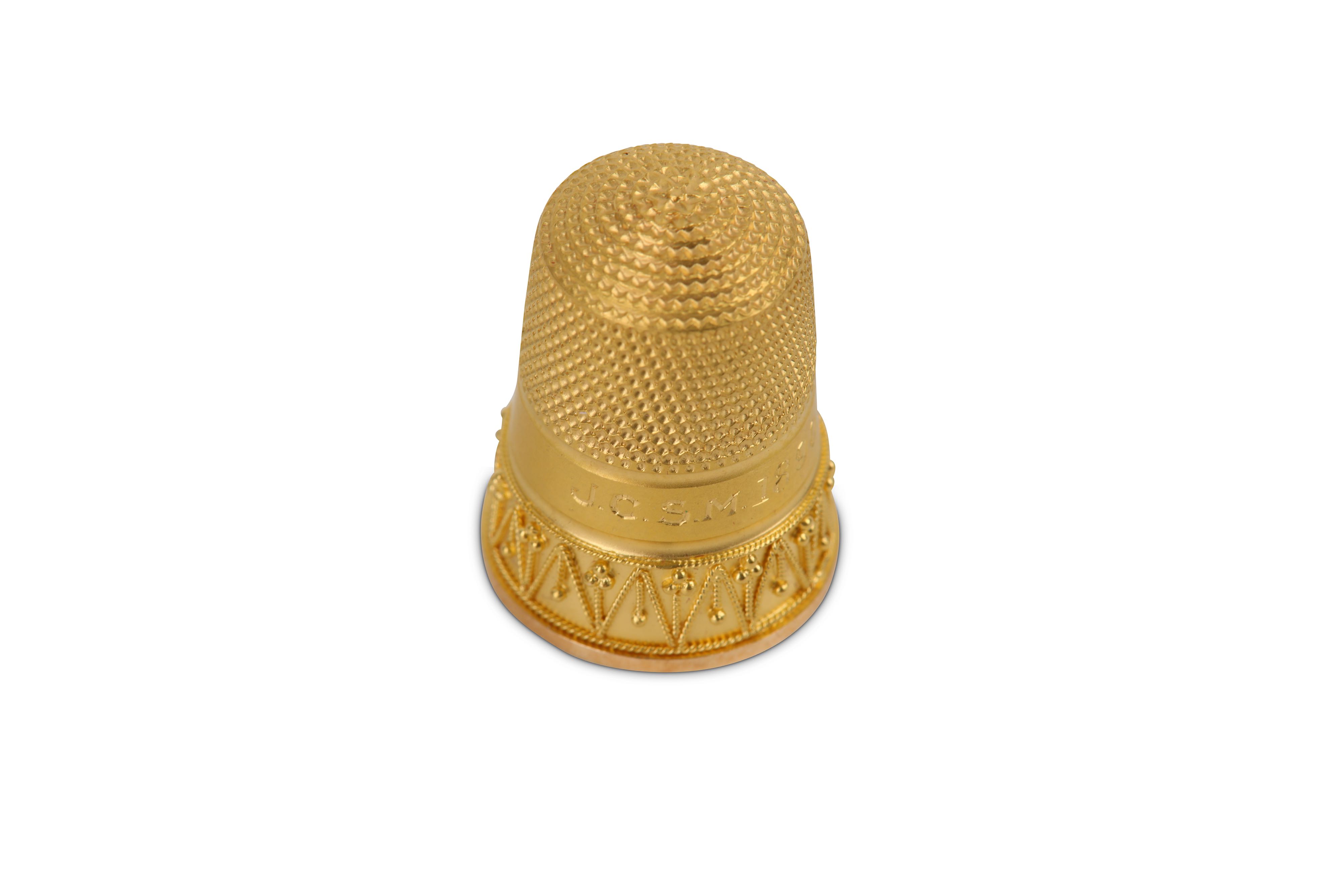 Lot 141 - A cased Victorian 15 carat gold thimble,
