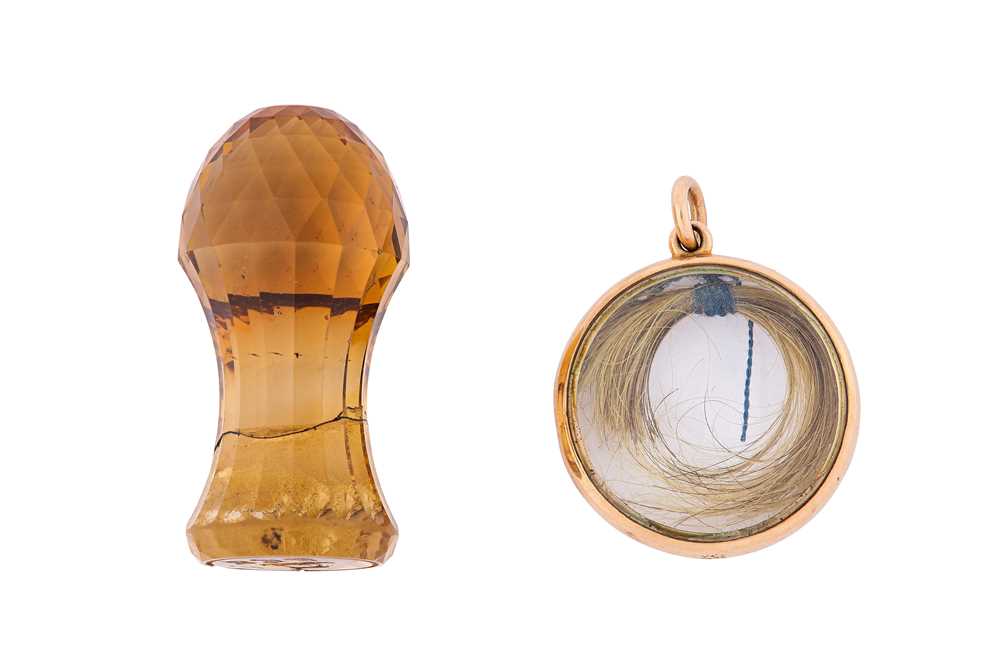 Lot 7 - A mourning locket, circa 1905 and a late 19th