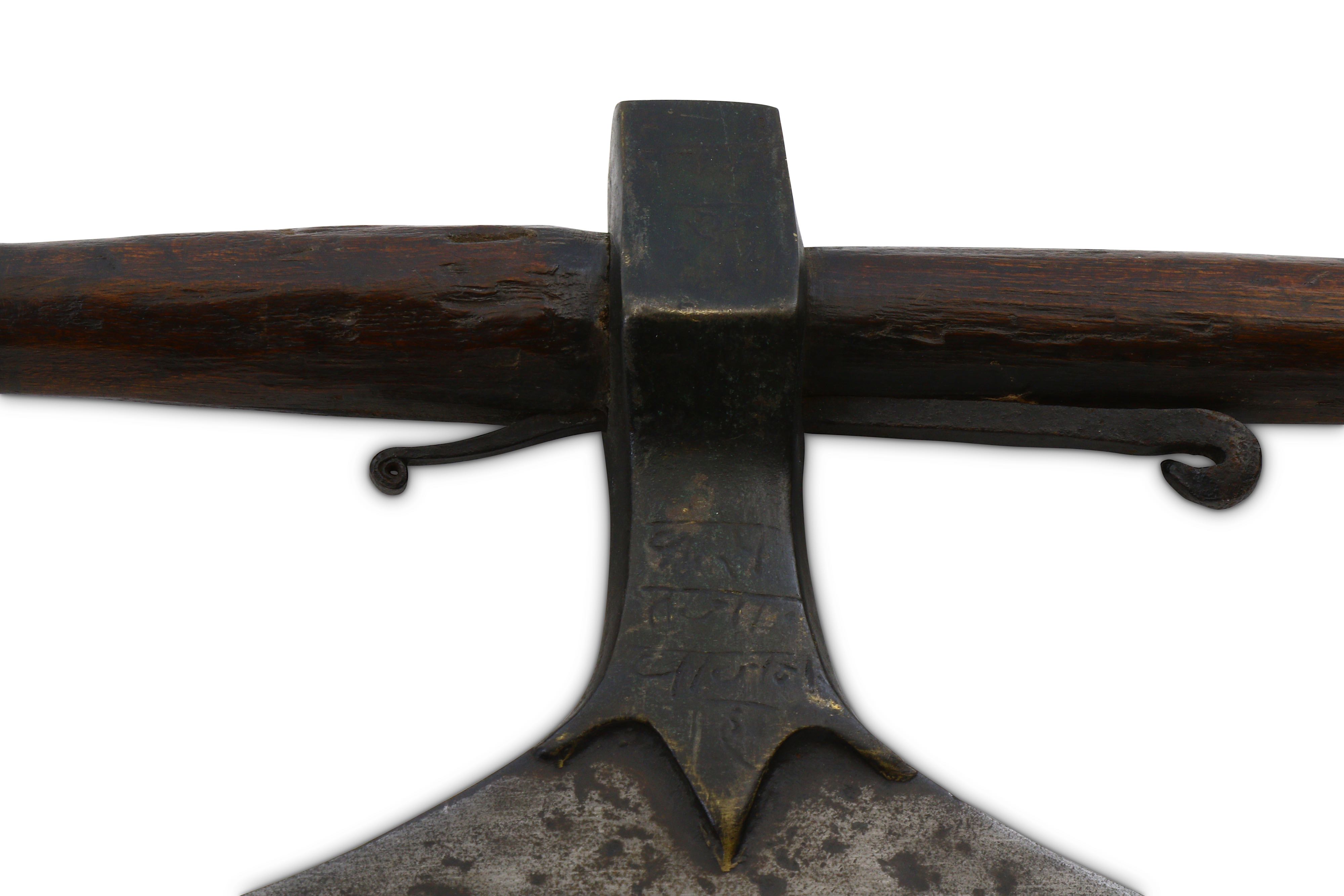 Lot 37 - A 19th century Indian bullova fighting axe.