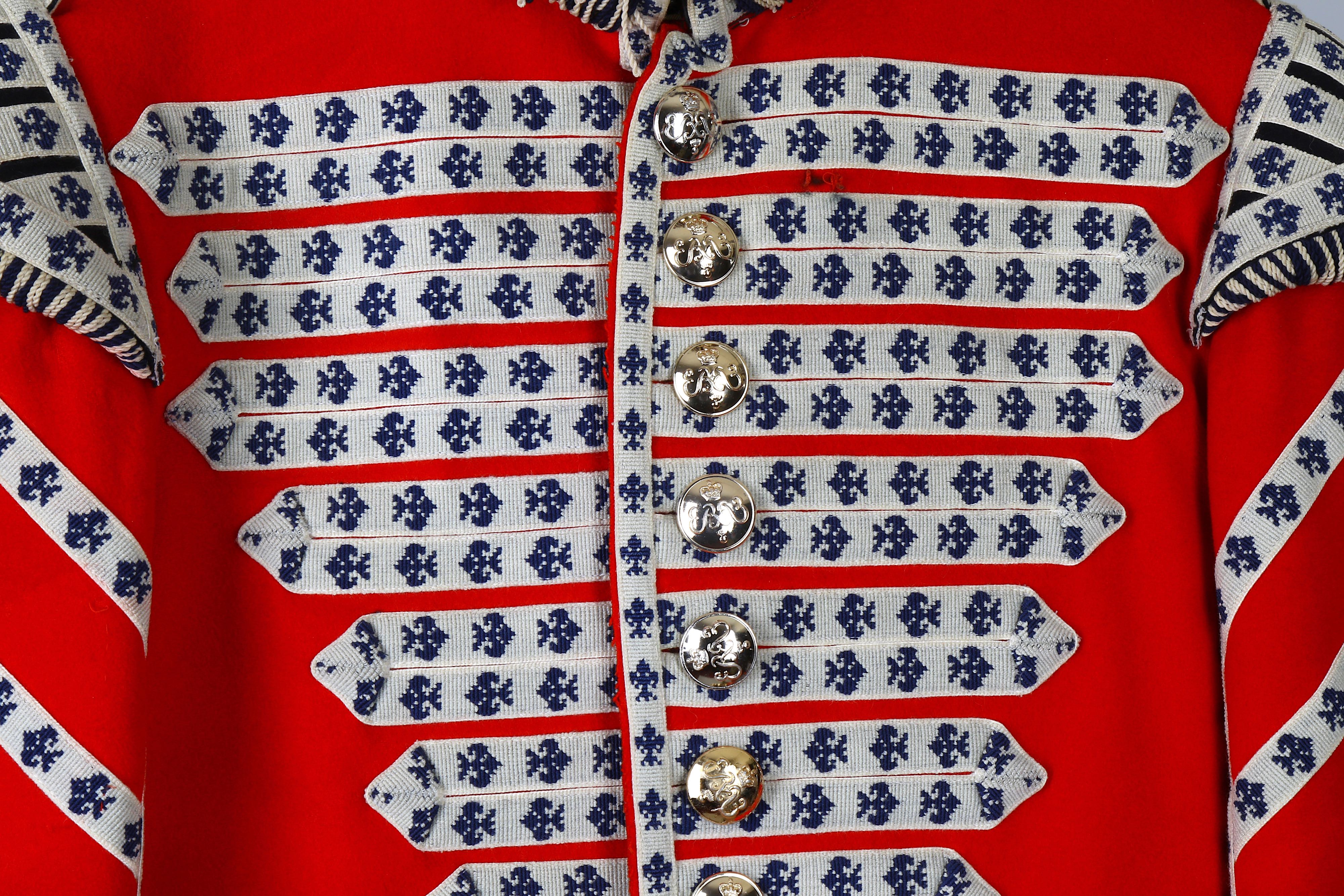 Lot 204 - An Irish Guards regimental mess dress jacket