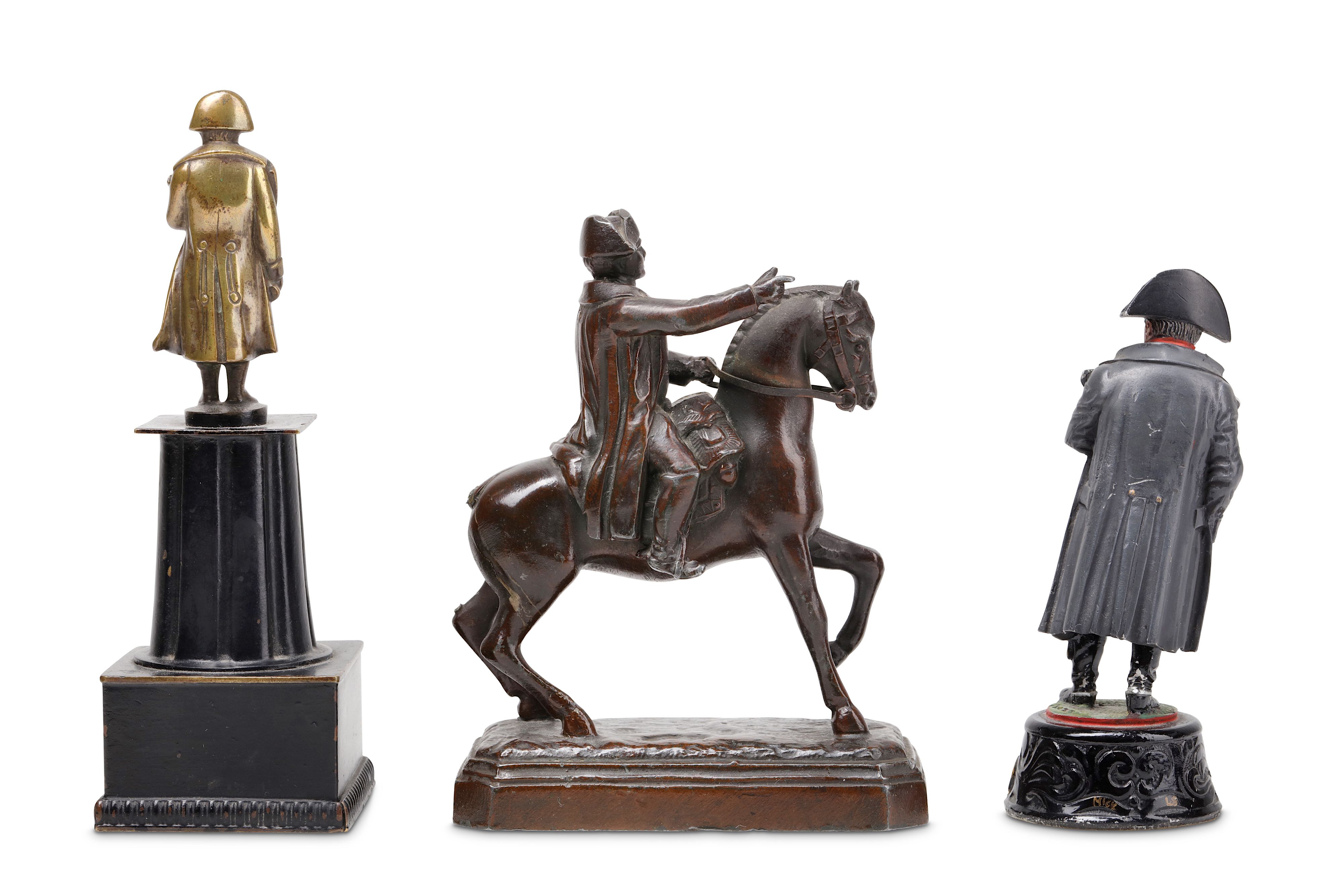 Lot 203 - THREE SMALL MODELS OF NAPOLEON comprising a